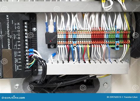 Air Wires Hi Voltage Electric Line Supports At Corn Field Under Blue