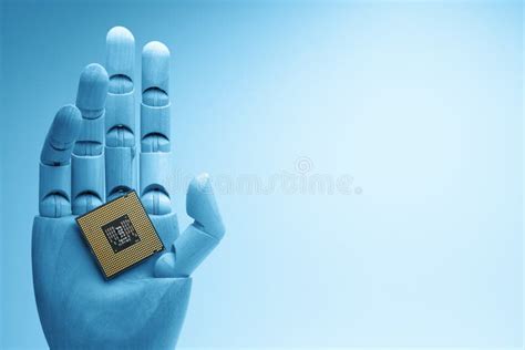 CPU In Robotic Hand Stock Photo Image Of Closeup Chip