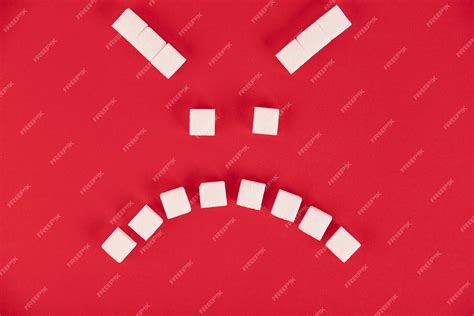 Premium Photo On A Red Background Cubes Of White Sugar In The Form