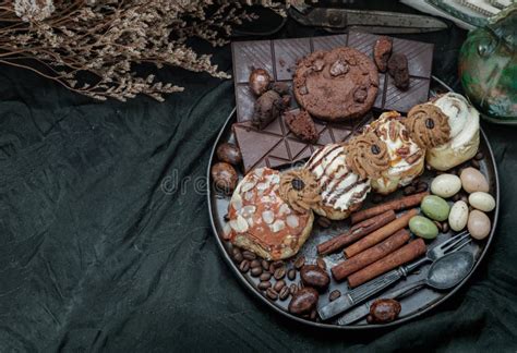 Assorted Cinnamon Rolls Dark Chocolate Bars Cookies Pieces And Balls