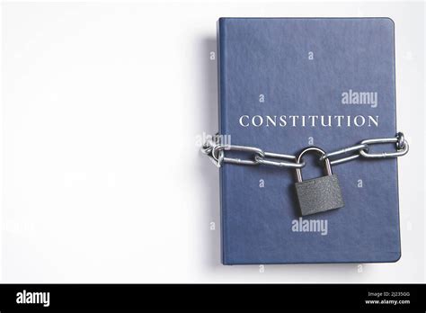 The Book Is Locked Under Lock And Key On A White Background Secret Archive Chain On The Book