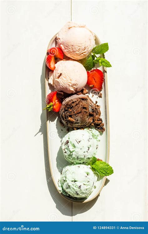 Selection Of Different Ice Cream Scoops Such As Mint Chocolate And Strawberry Stock Image