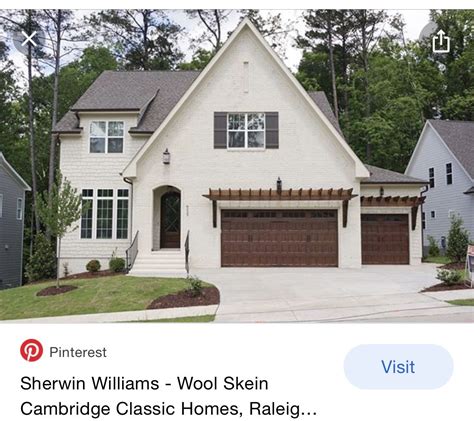 Brown House Exterior With White Trim