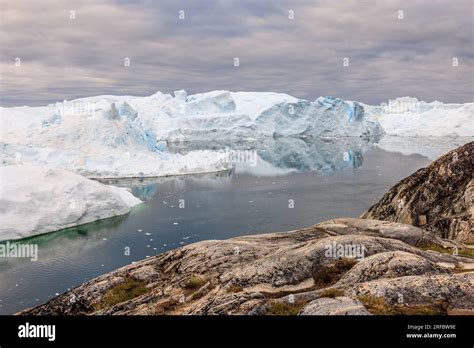 Scenic Landscape Of Ilulissat Icefjord Unesco Site Filled With Huge