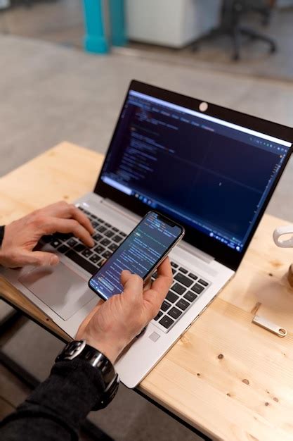 Premium Photo A Programmer Coding At Lap Top At Coworking Space High Quality Photo