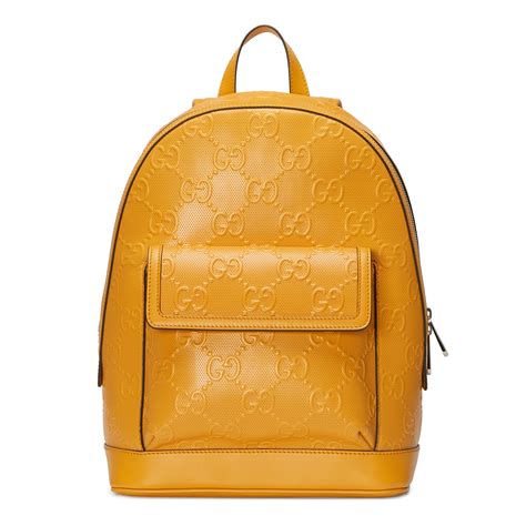Gucci Gg Embossed Backpack In Yellow Modesens