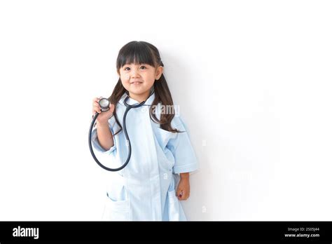 Girl Playing Nurse Stock Photo Alamy