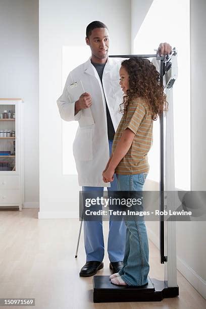Doctor Measure Height Photos And Premium High Res Pictures Getty Images