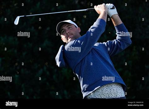 Scottie Scheffler Watches His Shot From The Third Tee During The
