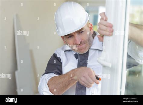 Double Glazing Window Installer Fixing Some Defect Stock Photo Alamy