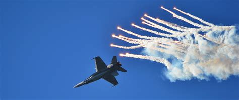 [3839x1620] Finnish F A 18 Hornet Popping Flares R Widescreenwallpaper