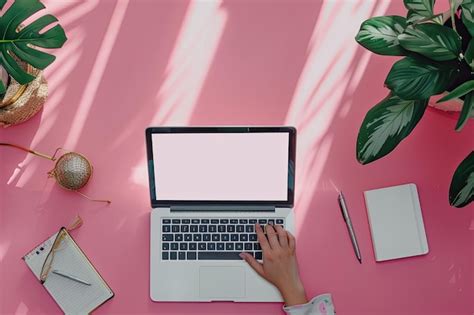 Woman Typing By Laptop On Office Pink Table Space For Text Premium Ai