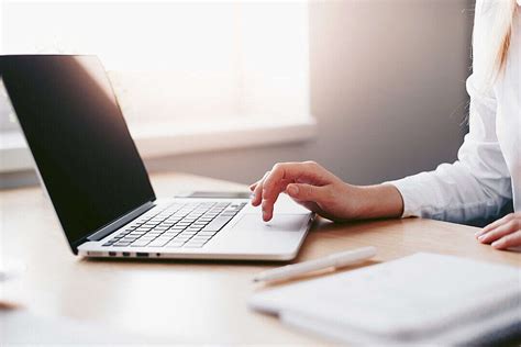 Man Checking His Iphone Working At Home Office Free Stock Photo