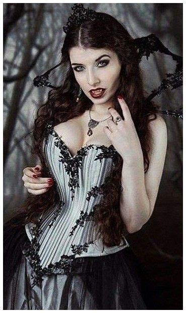 Bosomy Vampire Fangs Babe Richardbordeaux