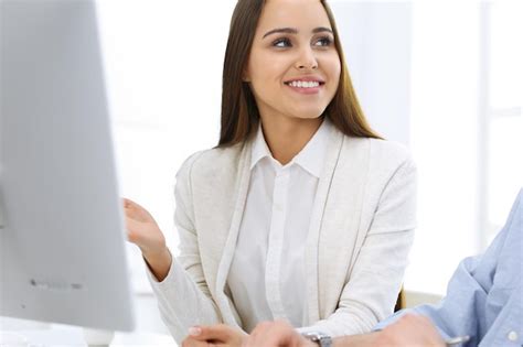 Premium Photo Business Woman And Man Sitting And Working With Computer In Office Colleagues