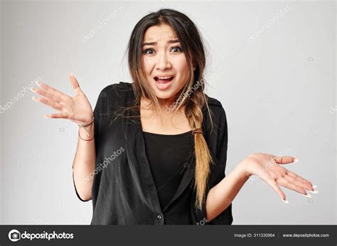 Portrait Perplexed Asian Kazakh Girl Dazed Face Expression Spreads