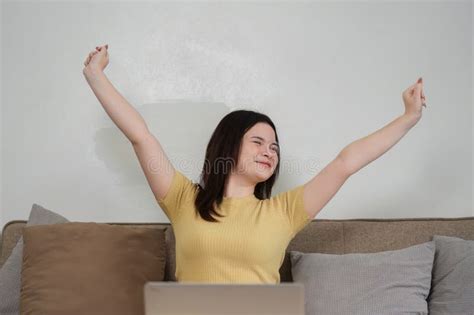 Work Life Balance And Remote Work A Woman Stretching During Her Home