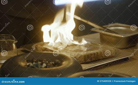 The Chef Cooks Meal In Flambe Style In Modern Gastro Cafe Stock Photo Image Of Flambe Seafood