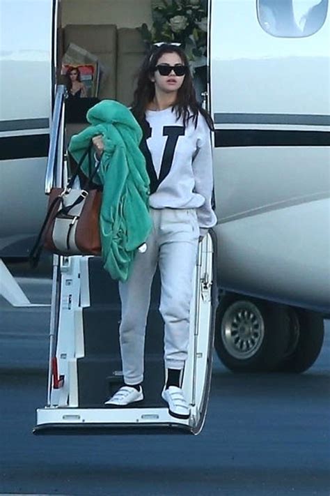 Selena Gomez Arrives At A Private Jet In Los Angeles