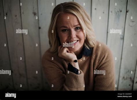 Portrait Of Smiling Blond Woman Stock Photo Alamy