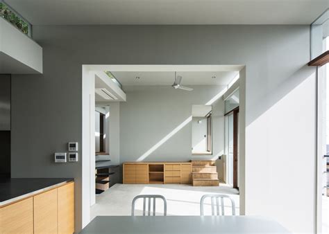 House By Ym Design Office Has Four Layers Of Concrete Frames