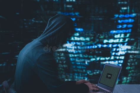 anonymous hacker with laptop in front of binary code cyber security