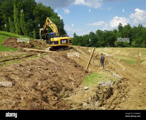 An Excavator From The Caterpillar Brand In The Construction Works