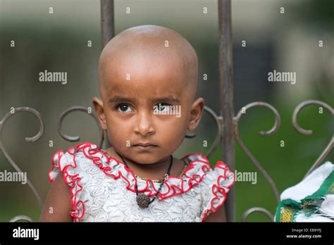 Girl With A Shaved Head After Making A Sacrificial Offering Portrait Meenakshi Amman Temple Or