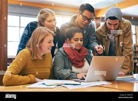 Everyone Trying To Solve A Problem Together A Cheerful Young Group Of