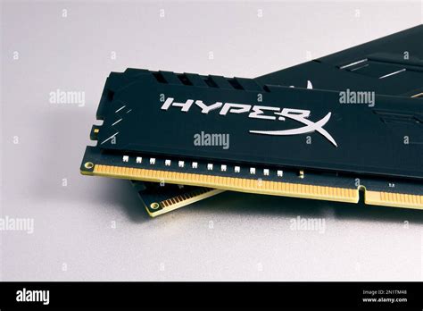 HyperX DDR RAM Modules On A Silver Surface Close Up Parts For Building And Upgrading A PC