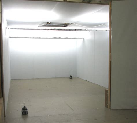arena used in the real robot experiments photograph left and as