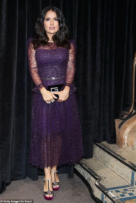 Salma Hayek Dazzles In A Purple Gown As She Arrives At Glam Gucci Show