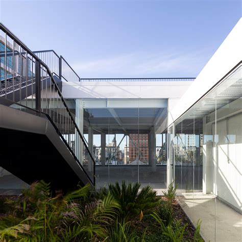 Psychologists Office And Tranquil Garden Hidden Behind Concrete Wall