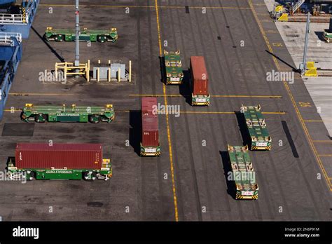Automated Guide Vehicles Agv Remote Controlled Electric Shipping Container Movers Are Seen