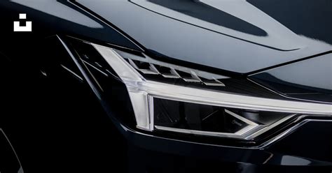 차고에 주차된 검은색 자동차의 클로즈업 사진 Unsplash의 무료 차 이미지