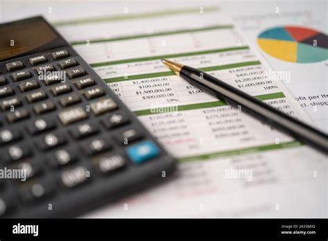 Calculator On Spreadsheet Paper Finance Development Banking Account Statistics Investment