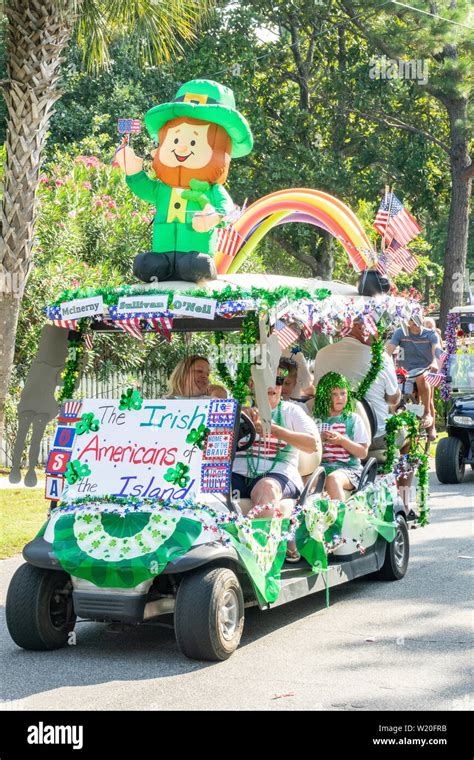A Golf Cart Float Decorated In Irish Themes During The Annual