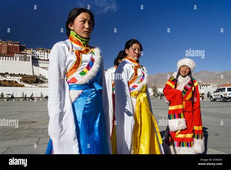 Tibetan Girls In Traditional Dress By The Potala Palace Lhasa Tibet