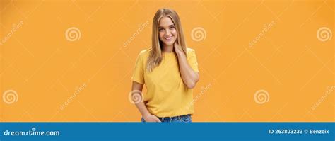 Portrait Of Shy And Timid Feminine Girl With Tan And Straight Fait Hair
