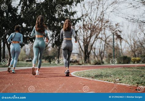 Three Women Jogging On A Track For Fitness And Health Stock Image Image Of Wellness Friends