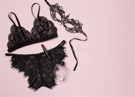 Set Of Black Lace Lingerie With Accessories On Color Background Top