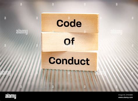 Business And Code Of Conduct Concept Sets Wooden Blocks With Words