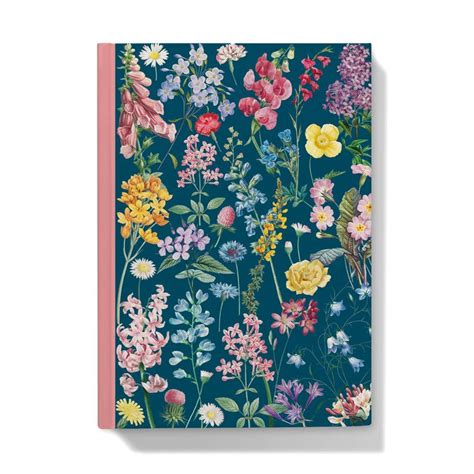A Blue Notebook With Colorful Flowers On It