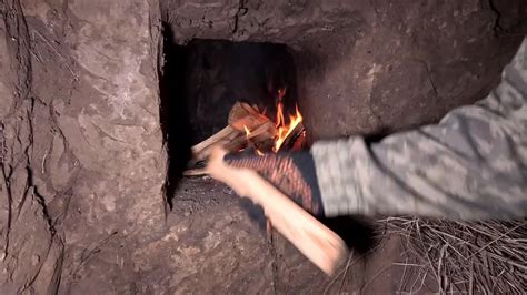 Building An Underground Shelter From Sticks And Strawpart037 Miles