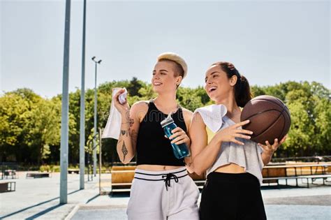 Two Athletic Female Friends Standing Together Stock Image Image Of