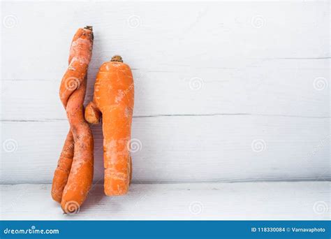 Funny Shape Of Carrot On White Board Background Two Carrots Are Having Sex Stock Photo Image