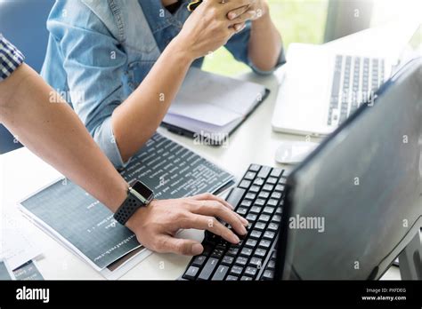 Asian Team Outsource Developer Looking Screen Programming Code Working With Laptop Computer