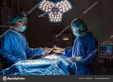Surgery Team Operating Surgical Room Doctors Working Operation Dark