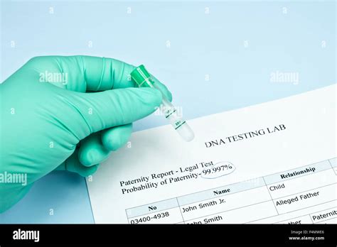 Paternity Test Results With Technician Holding Lab Sample Stock Photo Alamy