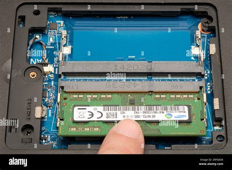 Securing A Typical Ram Memory Module Following Insertion Into A Memory Socket In A Laptop